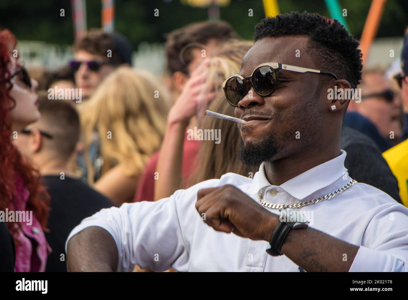 Man dancing at a music festival Stock Photo - Alamy