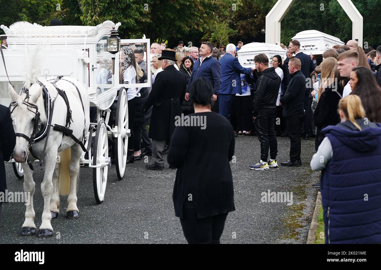 The coffins carrying the remains of Lisa Cash, 18, and her eight-year ...
