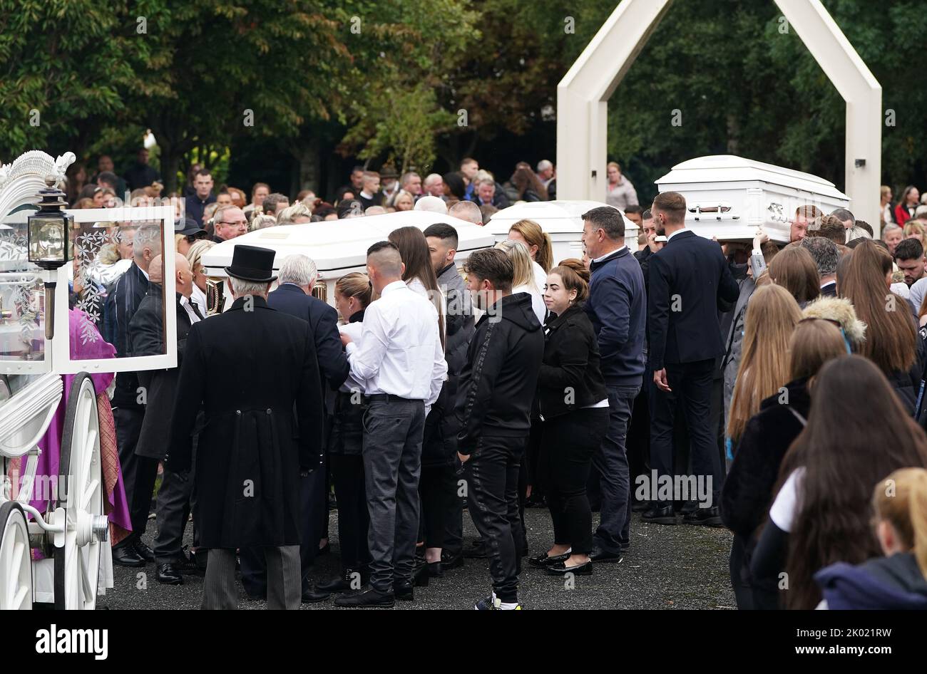 The coffins carrying the remains of Lisa Cash, 18, and her eight-year ...
