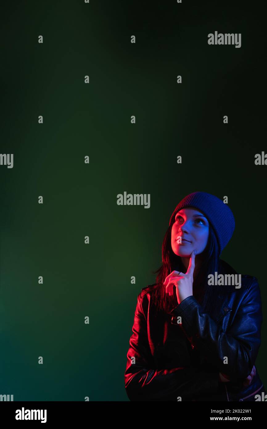 neon light portrait curious woman night lifestyle Stock Photo - Alamy