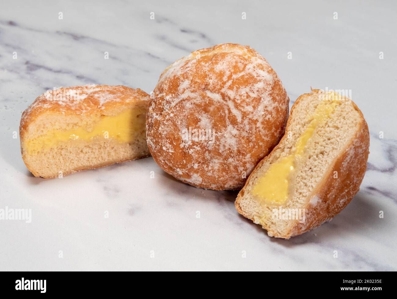 custard filled doughnuts Stock Photo - Alamy
