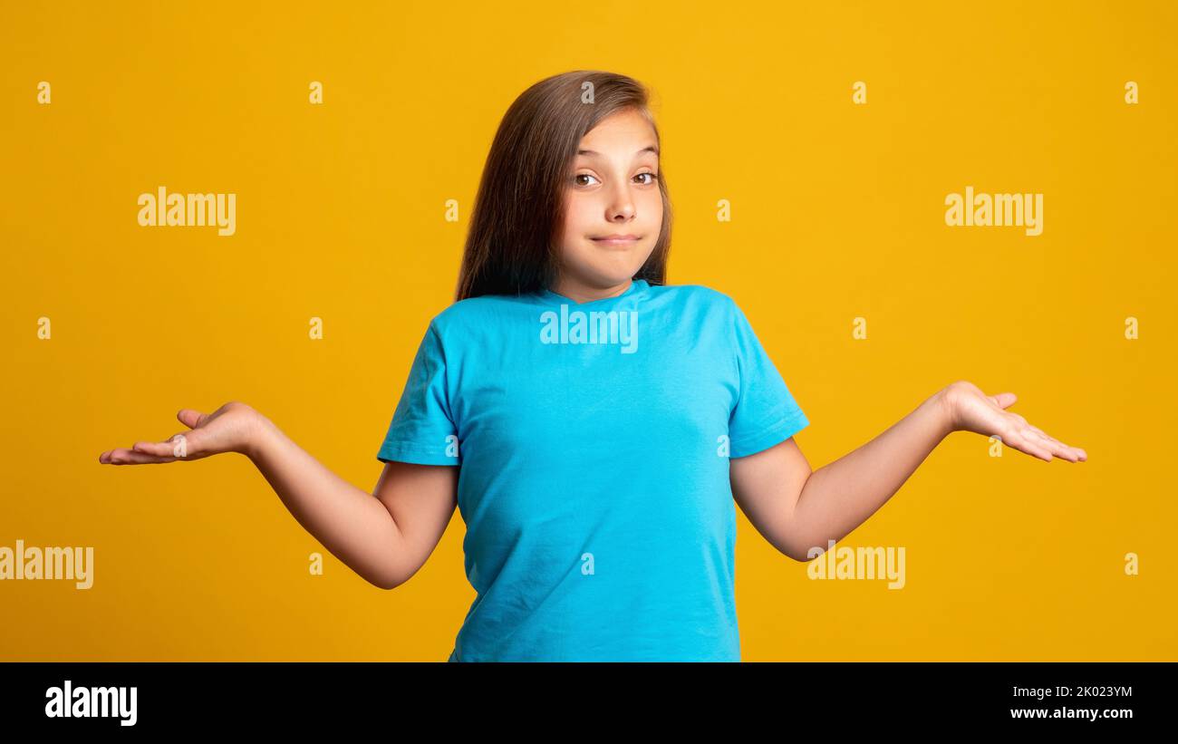 clueless child whatever shrug no idea who cares Stock Photo - Alamy