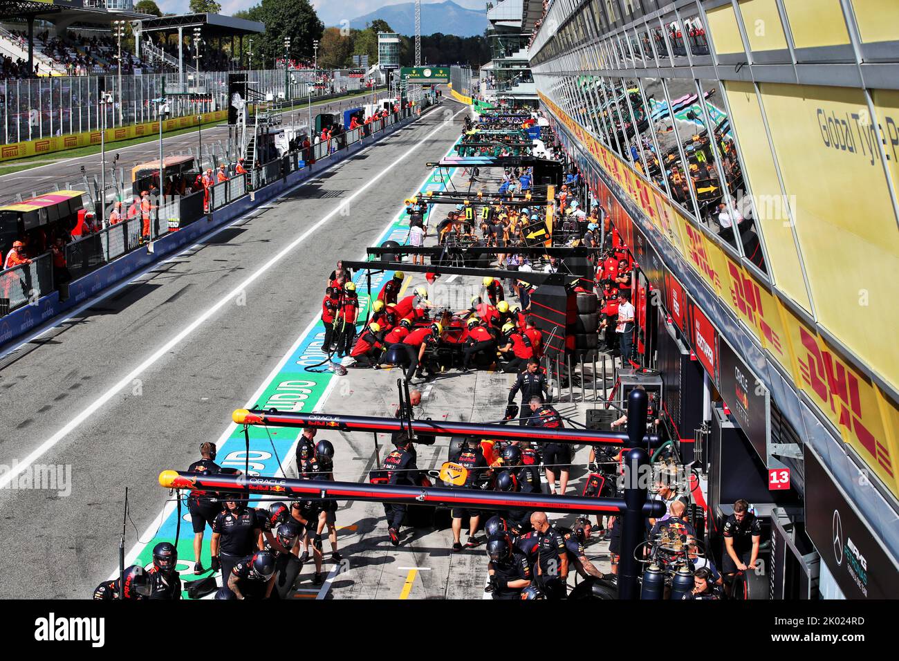 Max Verstappen (NLD) Red Bull Racing RB18 and Charles Leclerc (MON ...