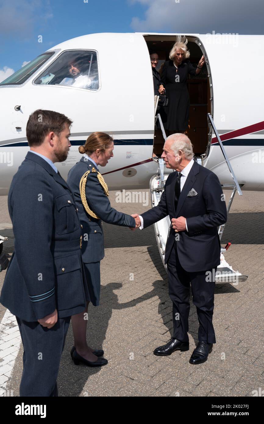 King Charles III and the Queen arriving at RAF Northolt in London are ...