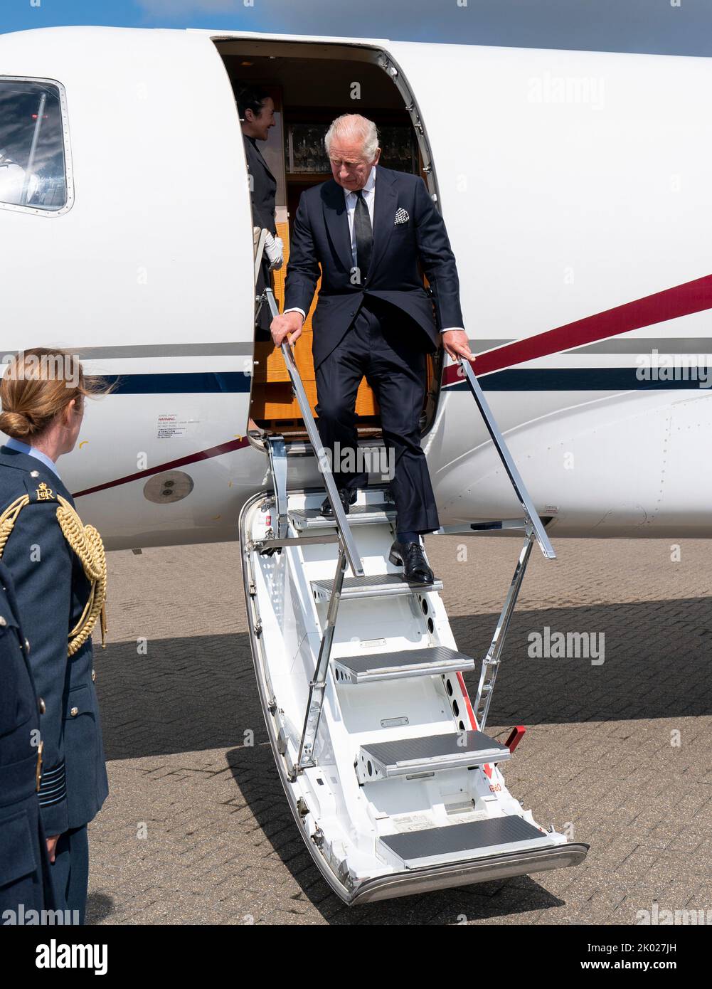 King Charles III and the Queen arriving at RAF Northolt in London are ...