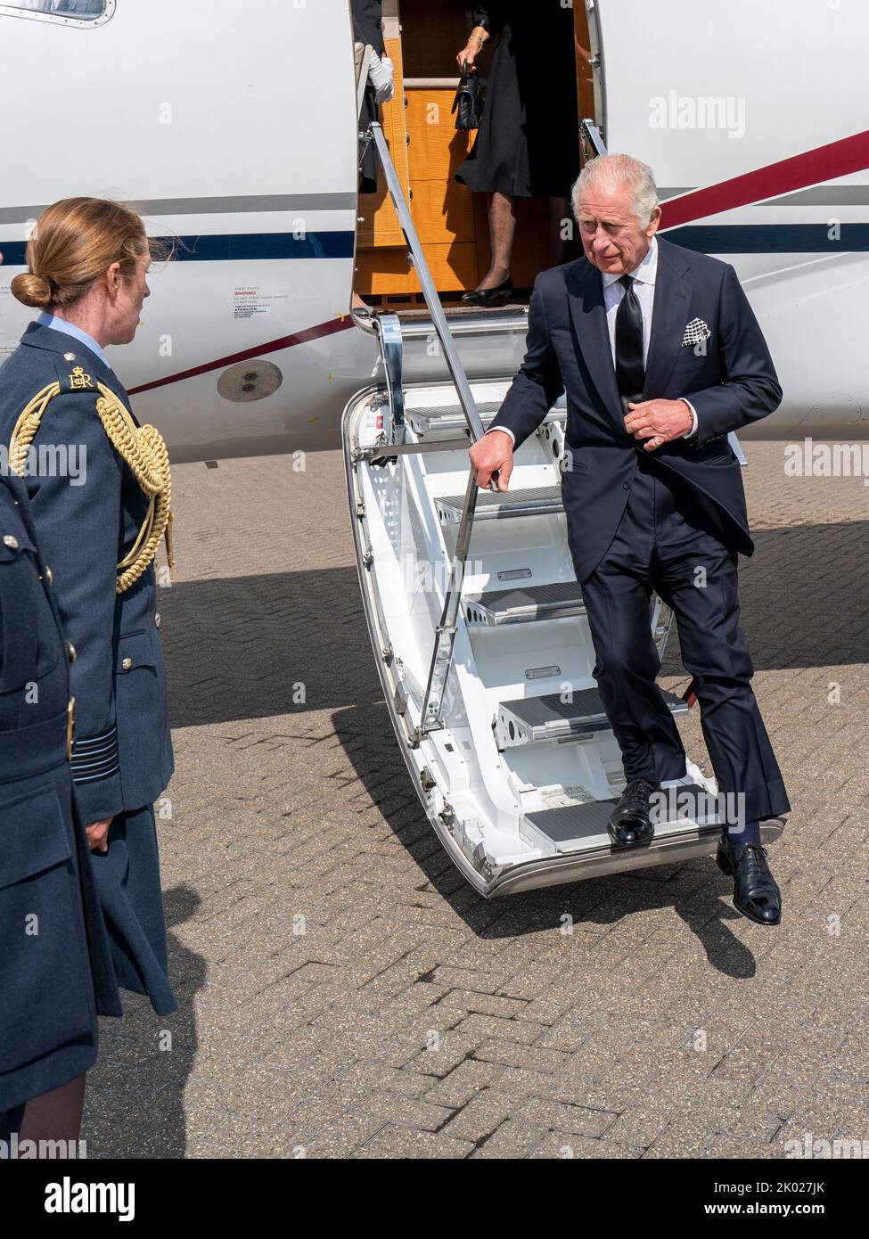 King Charles III and the Queen arriving at RAF Northolt in London are ...