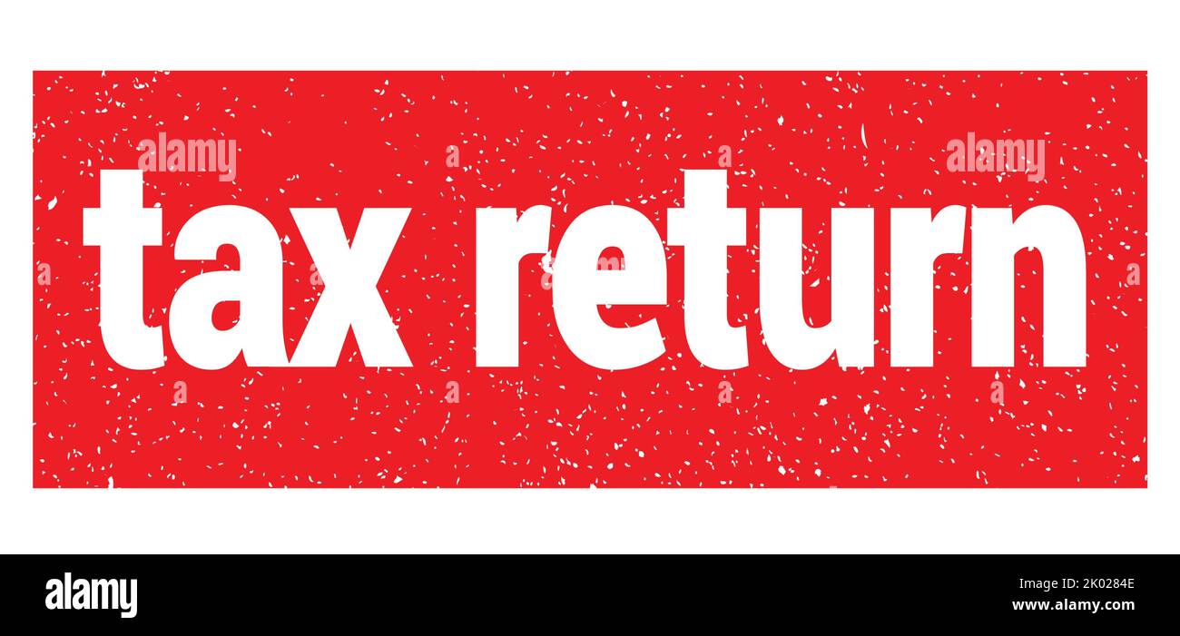 tax return text written on red grungy stamp sign Stock Photo - Alamy