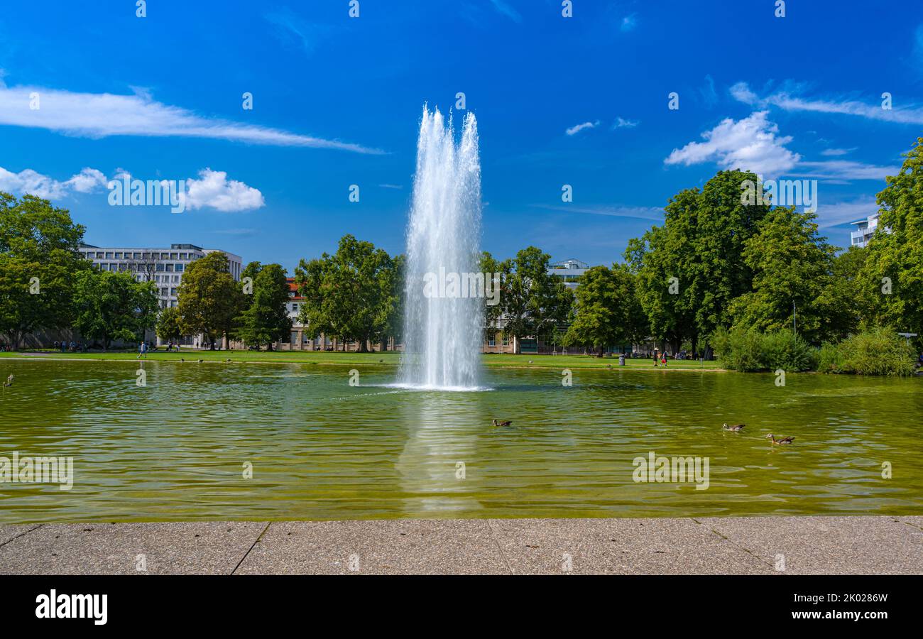 The palace park at the new palace in Stuttgart with fountain. Baden ...