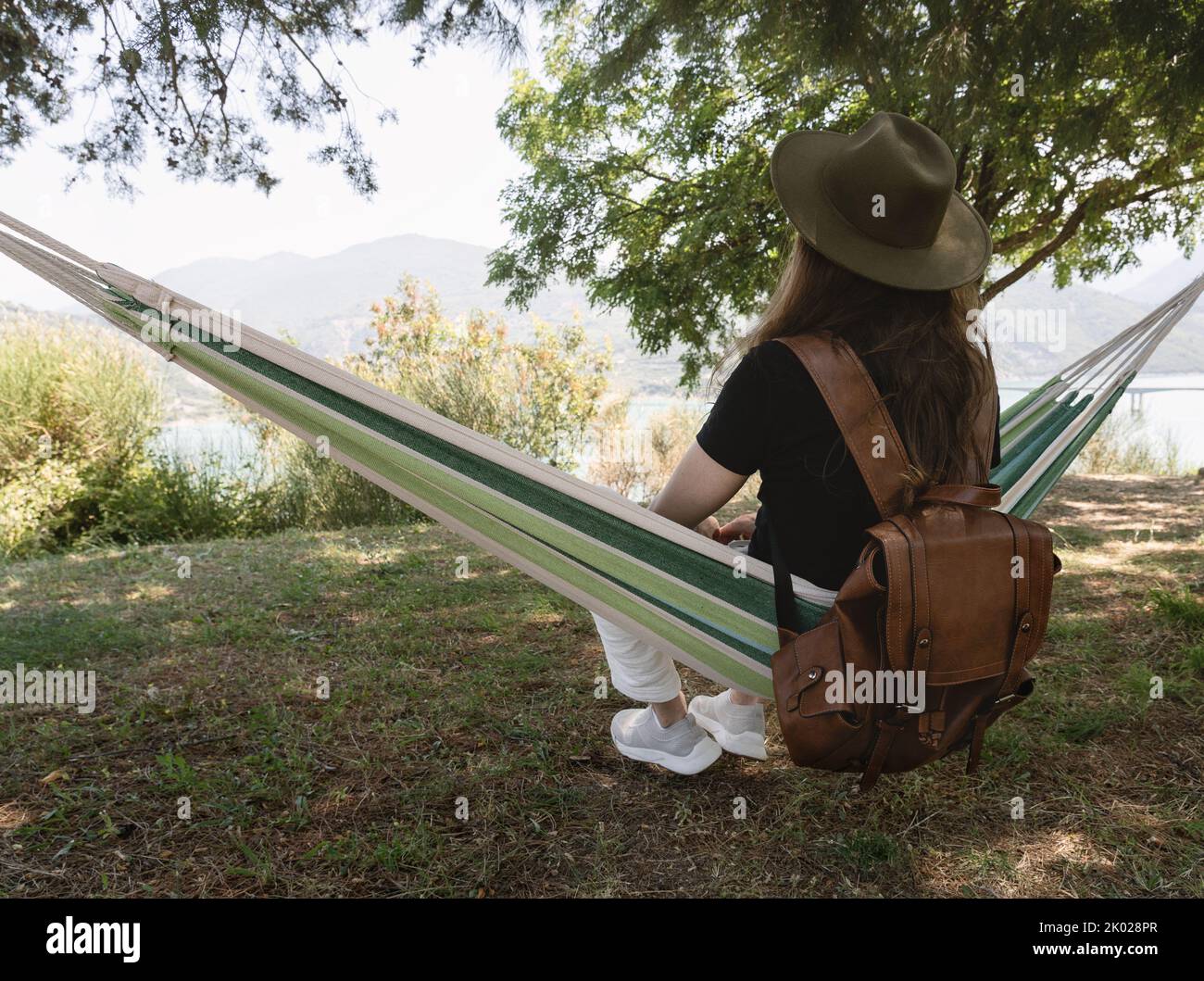 Joyful young man on hammock hi-res stock photography and images - Alamy