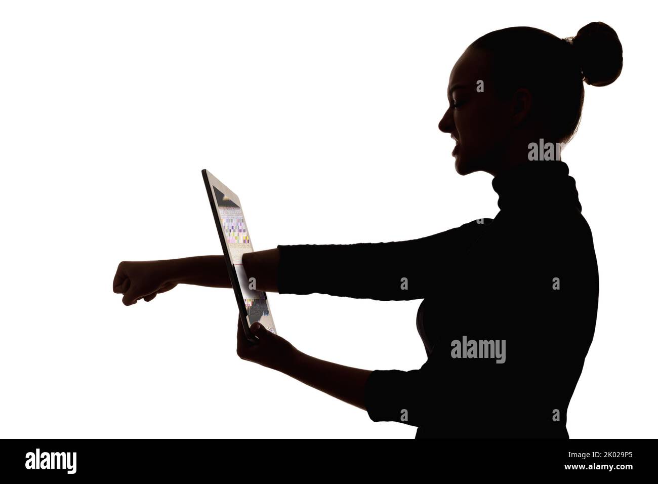 female silhouette frustrated woman breaking tablet Stock Photo - Alamy