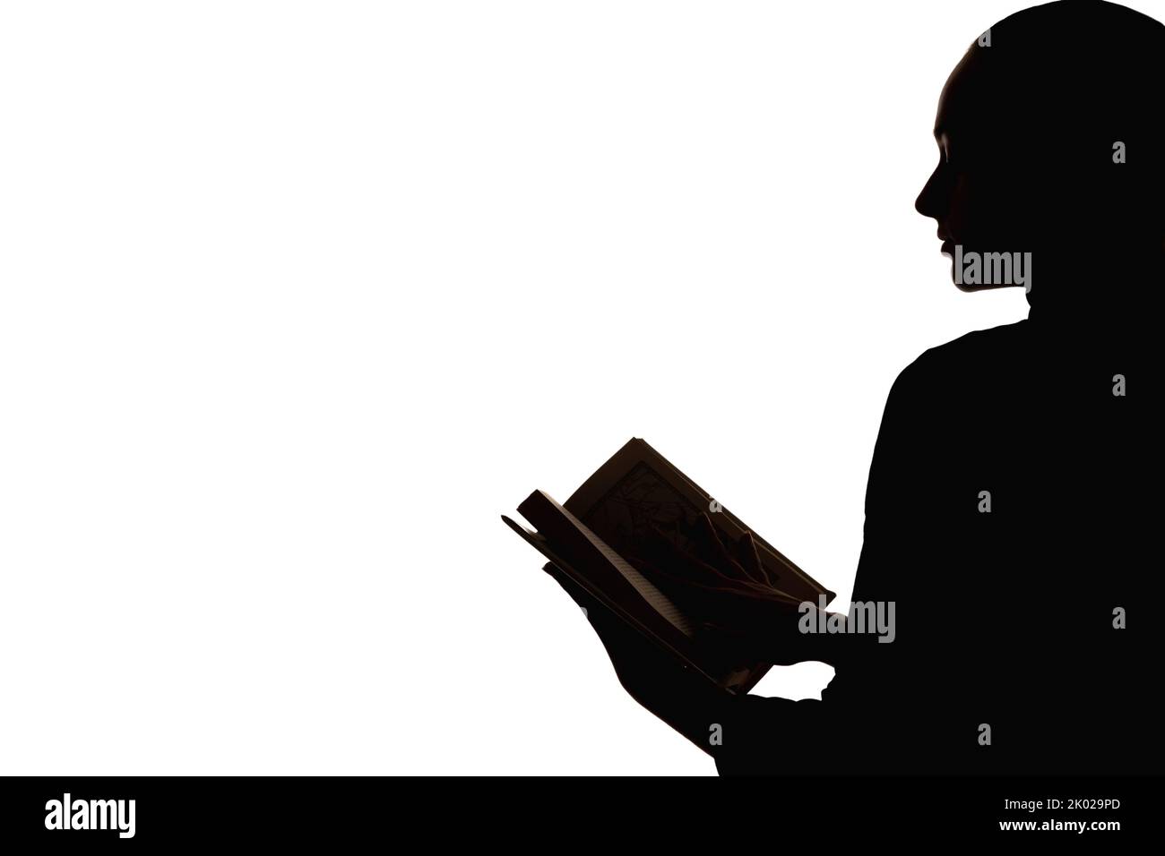 female silhouette reading hobby woman open book Stock Photo - Alamy