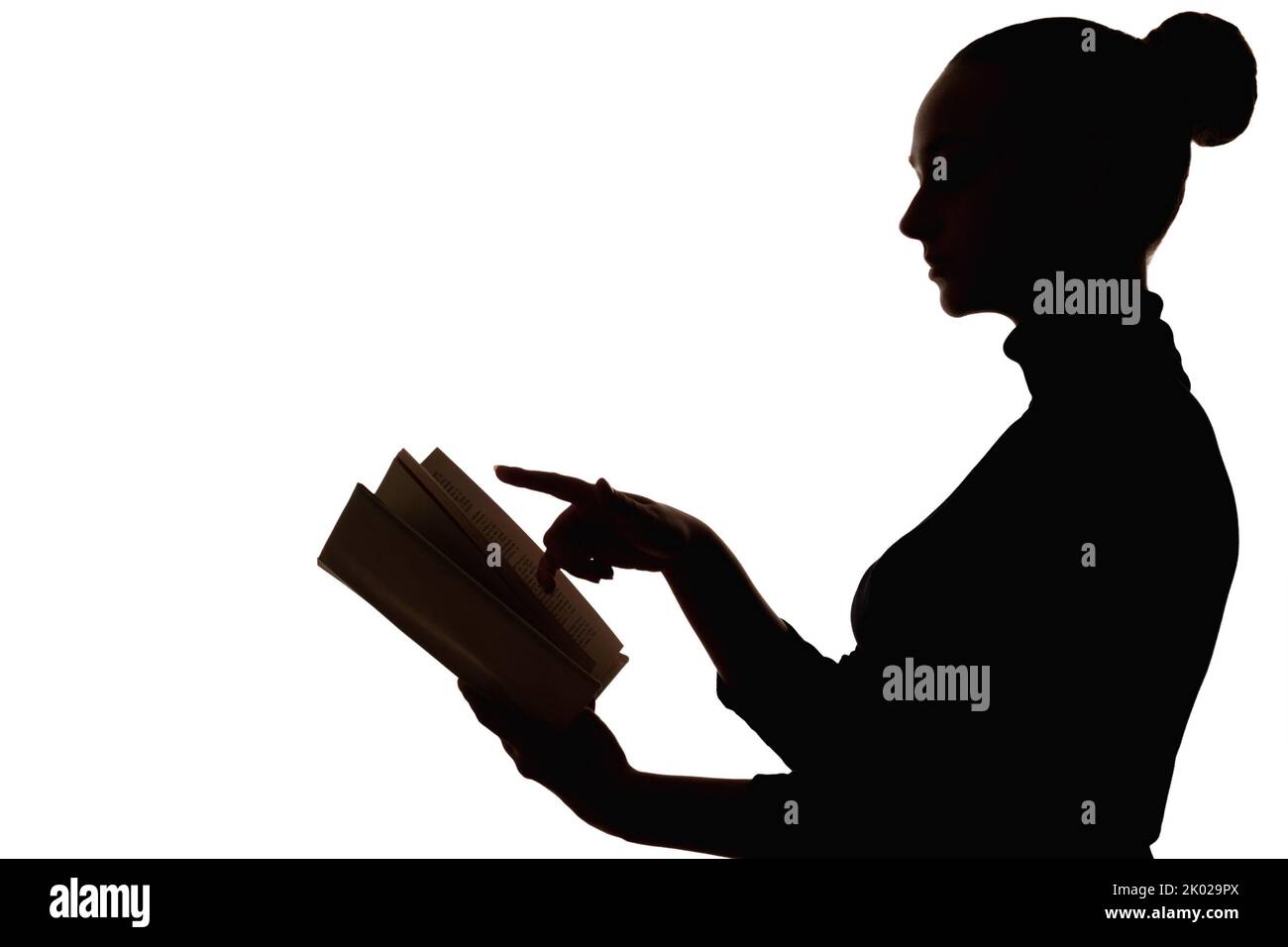 woman silhouette education teacher reading book Stock Photo - Alamy woman silhouette education teacher reading book Stock Photo - Alamy