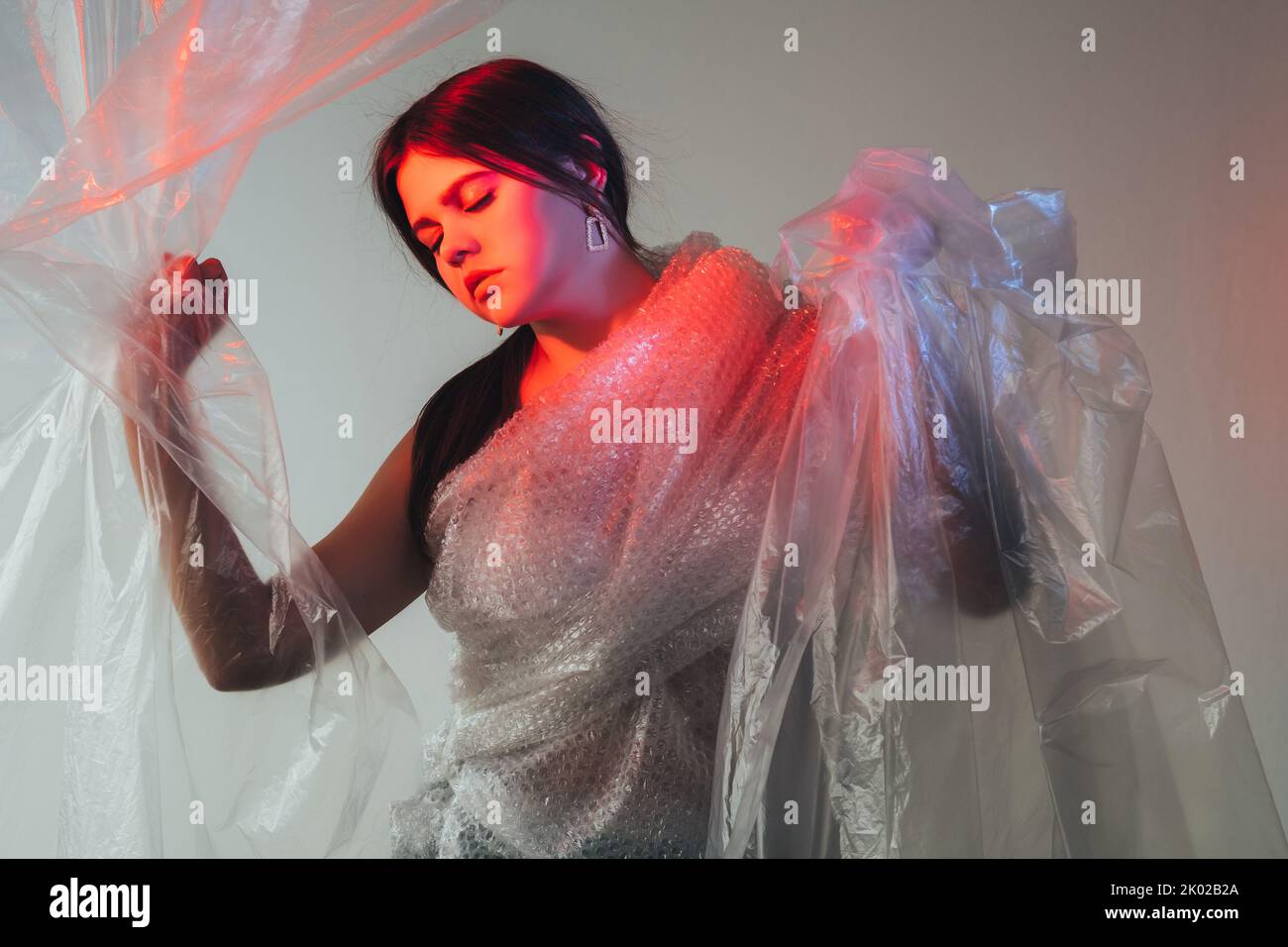 female despair self isolation hopeless woman red Stock Photo - Alamy