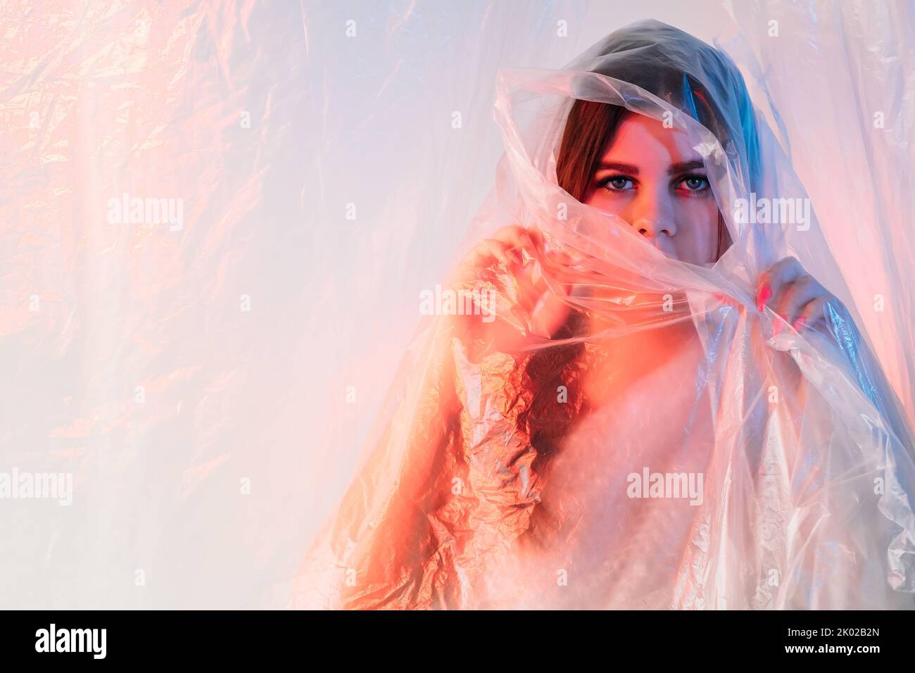 female loneliness self isolation woman neon light Stock Photo - Alamy