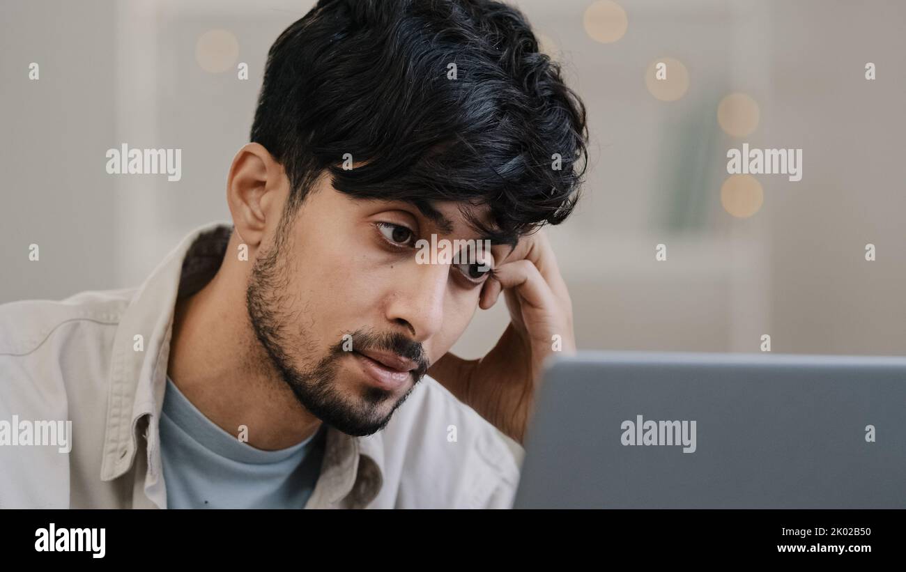 Front view male focused arabic young guy business man freelancer ...