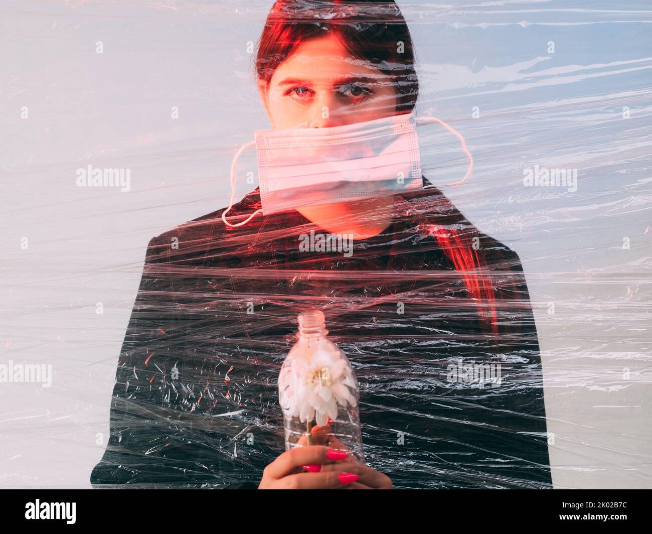 covid-19 self isolation defocused woman face mask Stock Photo - Alamy