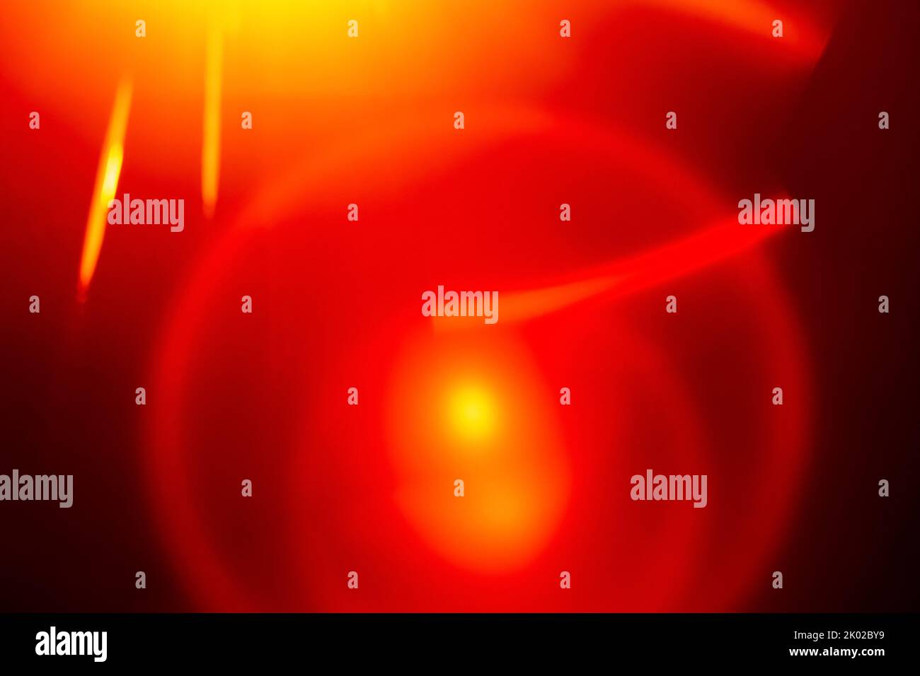 lens flare blur glare optical gleam red orange Stock Photo - Alamy