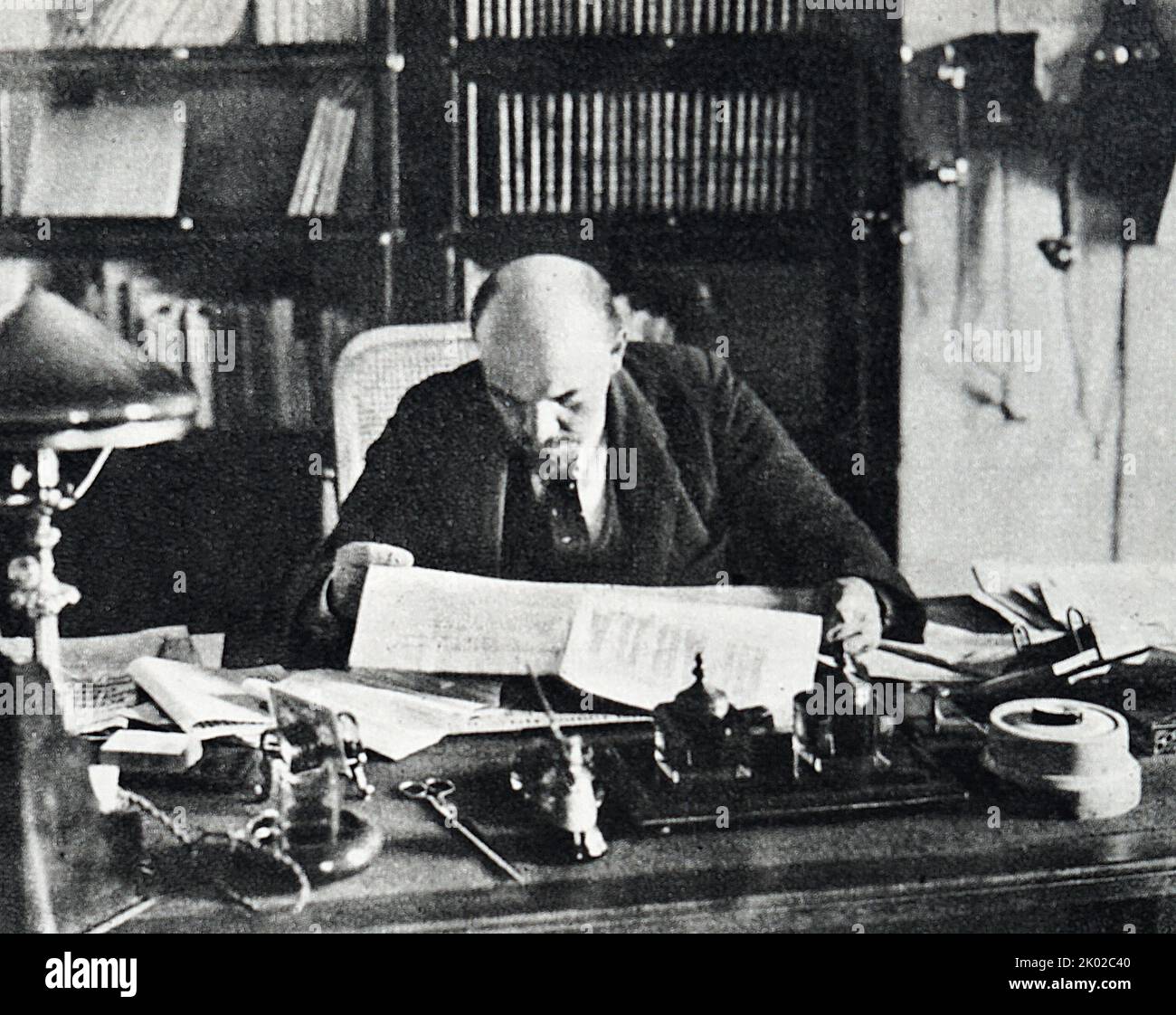 Vladimir Lenin at his desk in his office in the Kremlin. 1918. Moscow ...