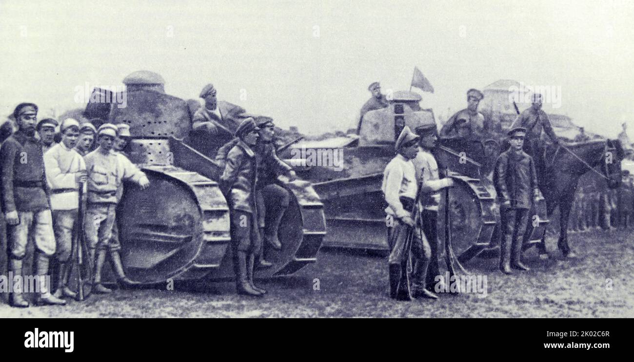 Peoples Revolutionary Army fighters at tanks captured from ...