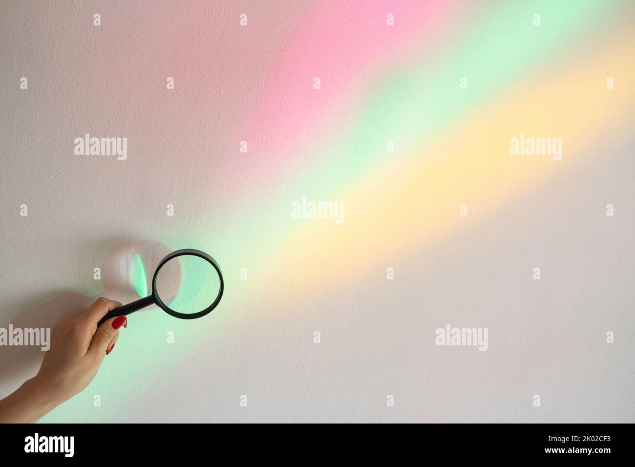 Magnifying glass rainbow effect hi-res stock photography and images - Alamy