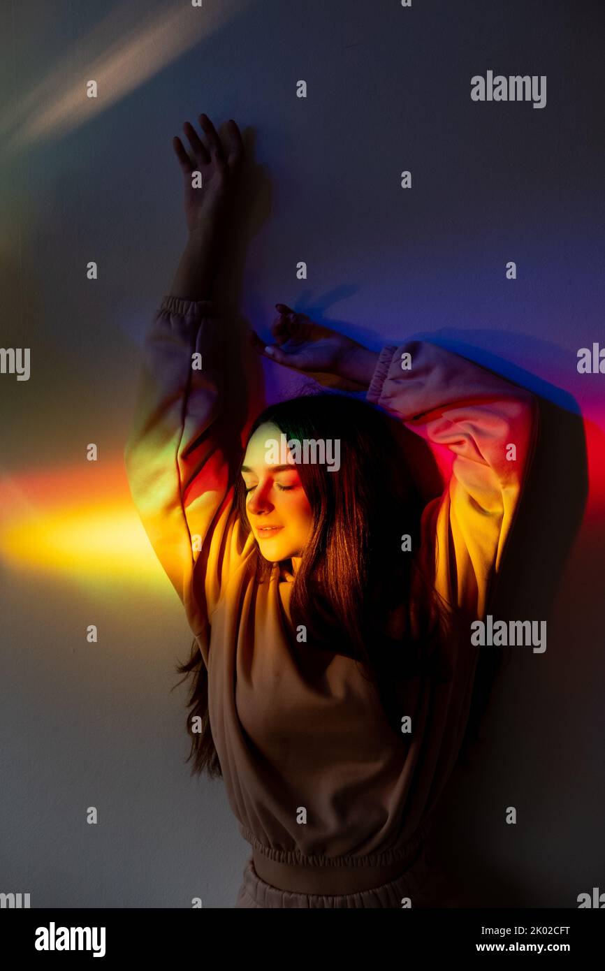 neon dreamful girl inner peace freedom rainbow Stock Photo - Alamy