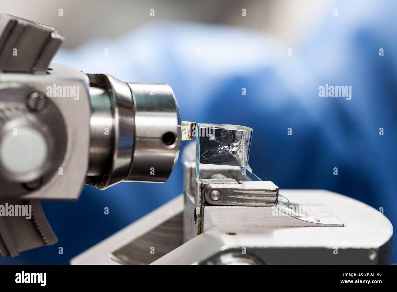 Closeup of an epoxy embedded tissue placed on the ultramicrotome to ...