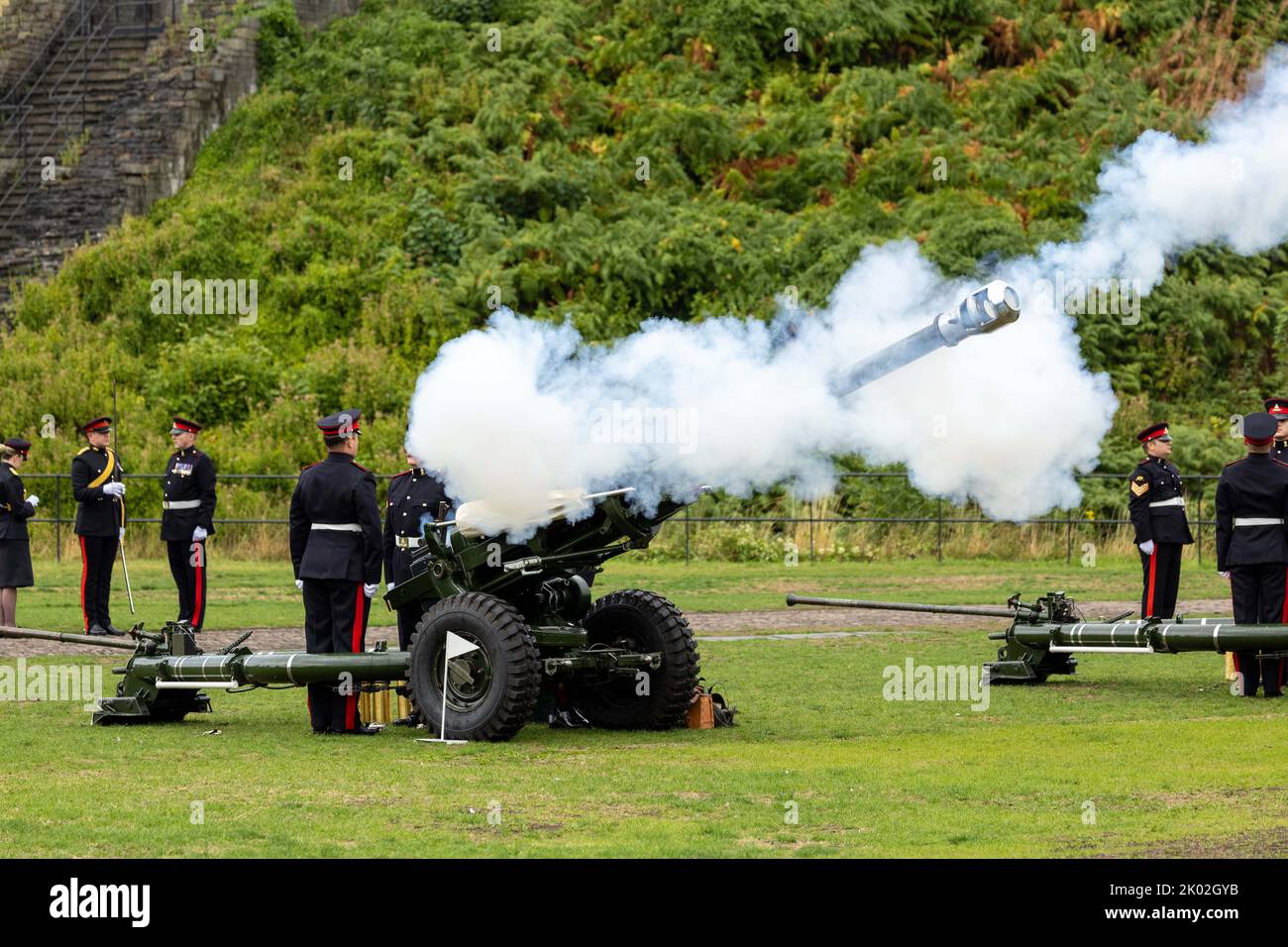 Soldiers fire a 96 gun salute at Cardiff Castle as a mark of respect ...