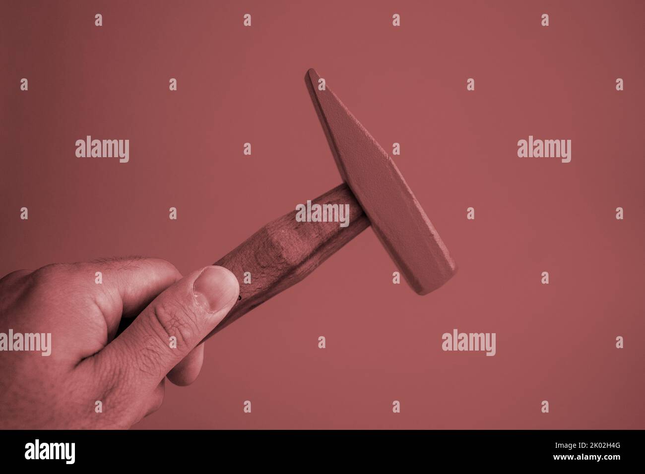 Hand held wooden handle hammer , isolated brown background, straight ...