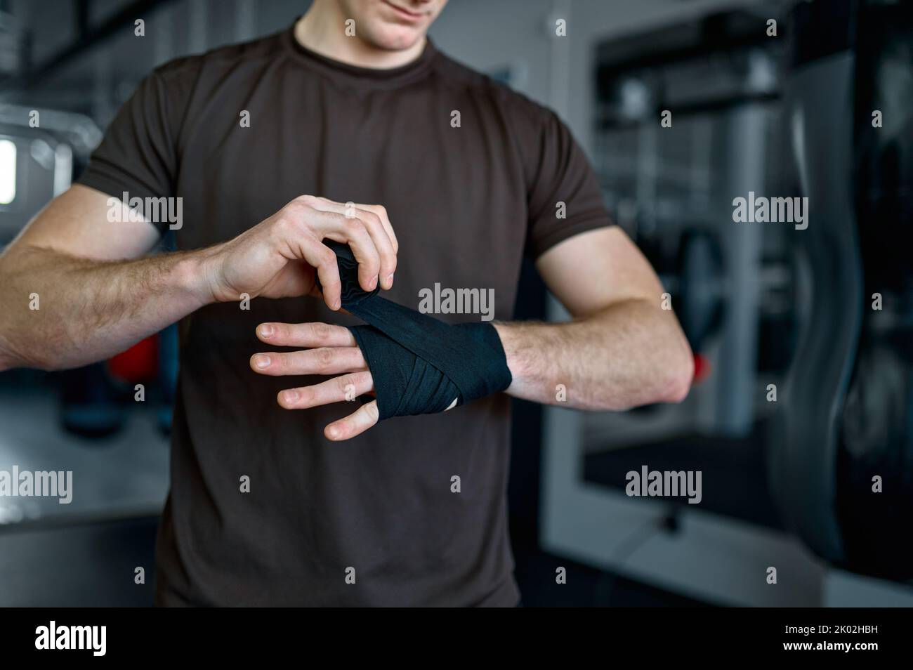 Close-up boxer wrapping hand with bandage Stock Photo - Alamy