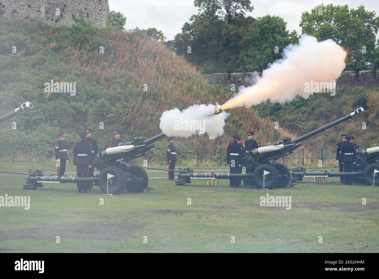 Soldiers fire a 96 gun salute at Cardiff Castle as a mark of respect ...