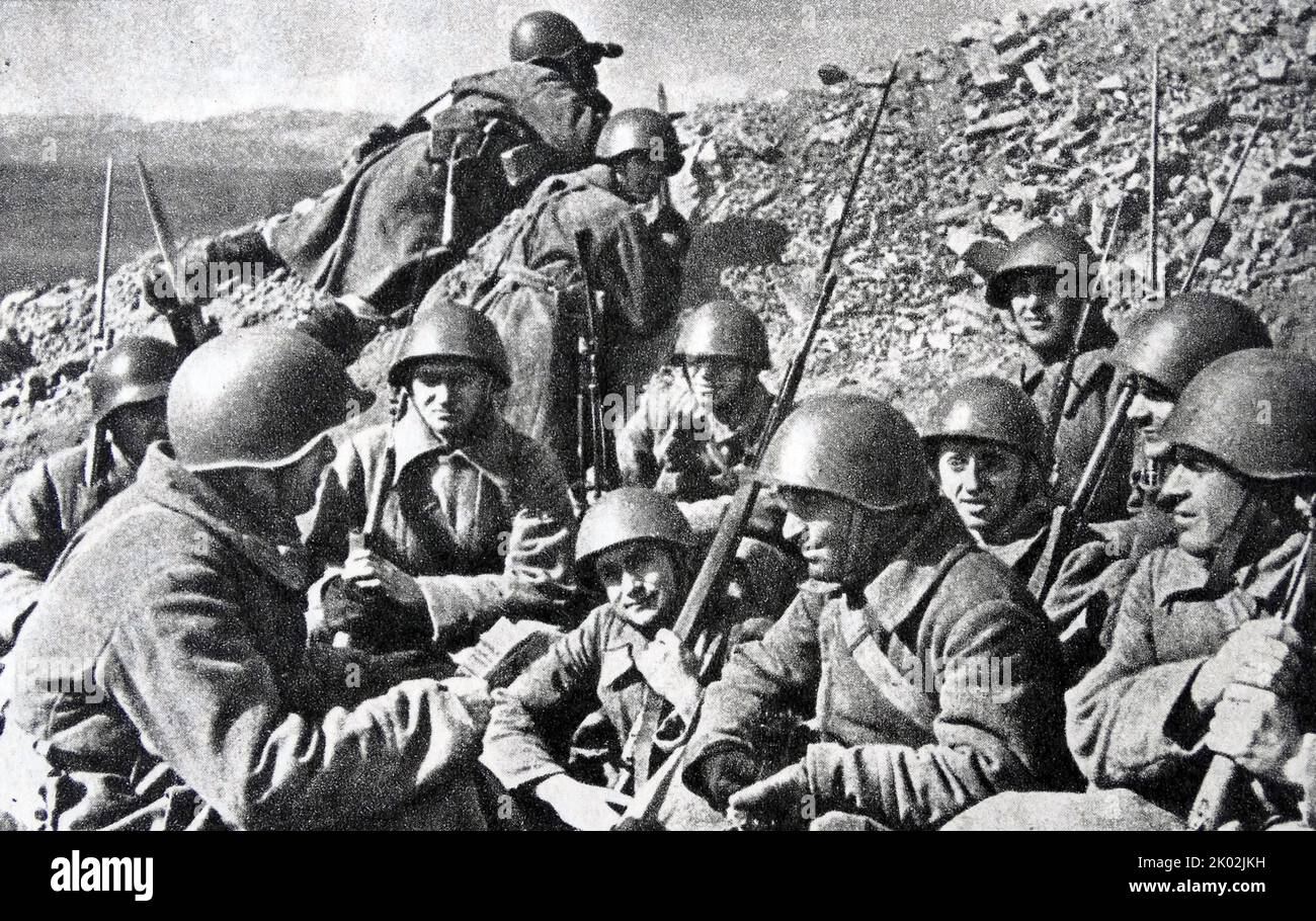 Political conversation in a unit of the Soviet army. 1942 Stock Photo ...