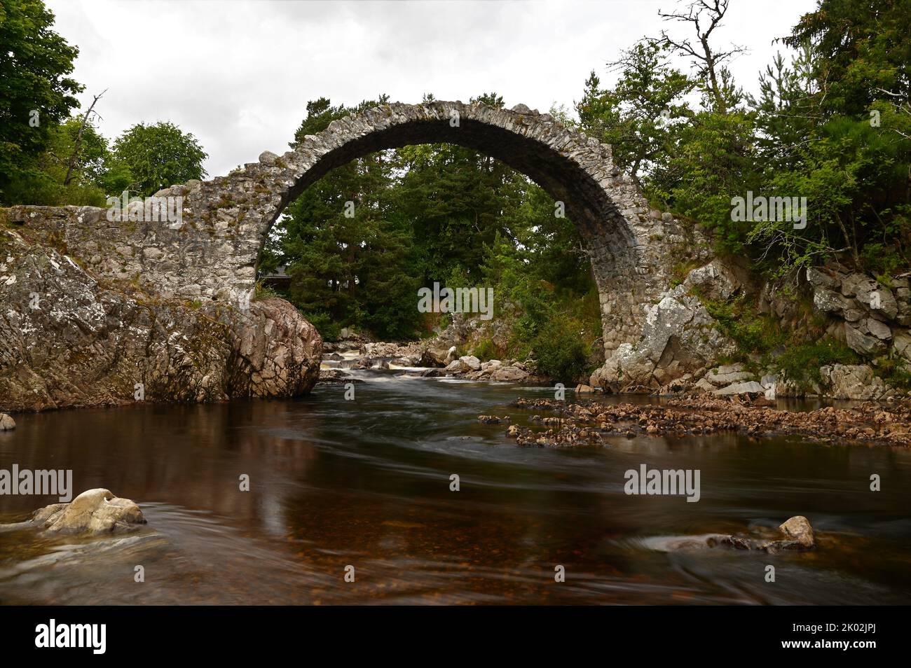 A view of the ancient historical stone pack horse bridge over the river ...