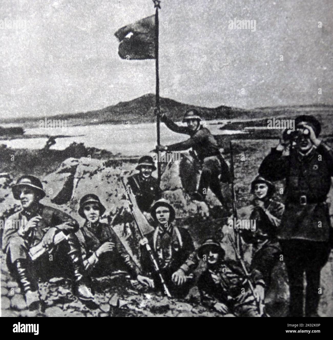 A group of Soviet soldiers hoists the Red Banner at Battle of Lake ...