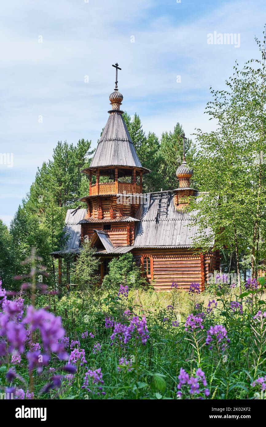 Modern log hipped-roof church in style of Russian wooden architecture ...