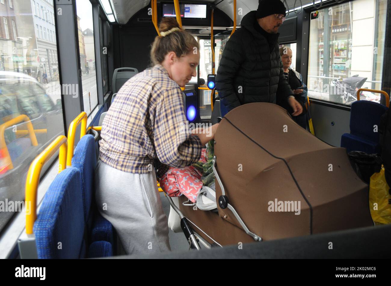 Copenhagen /Denmark/09 September 2022/ Female person transporting baby ...