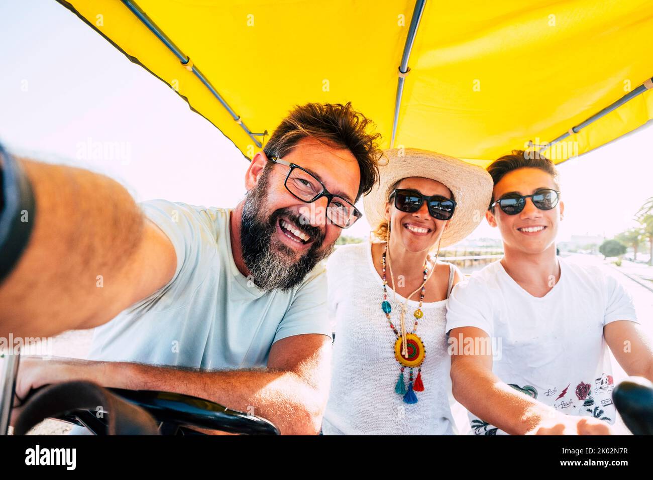 Enjoyed happy family father mother son have fun together on a surrey ...