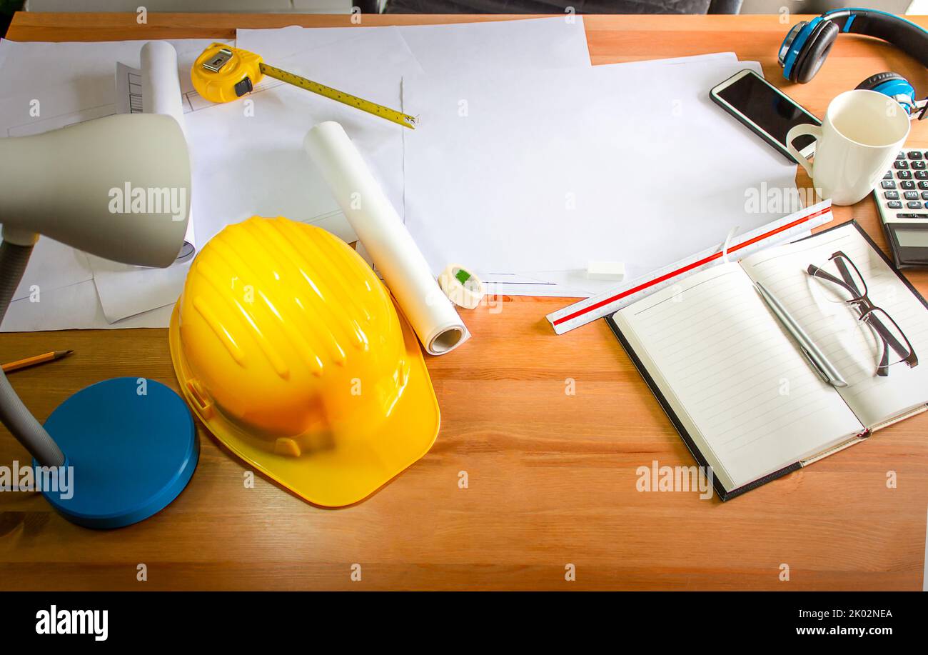 Work desk and architect's work equipment in the office, Yellow safety ...