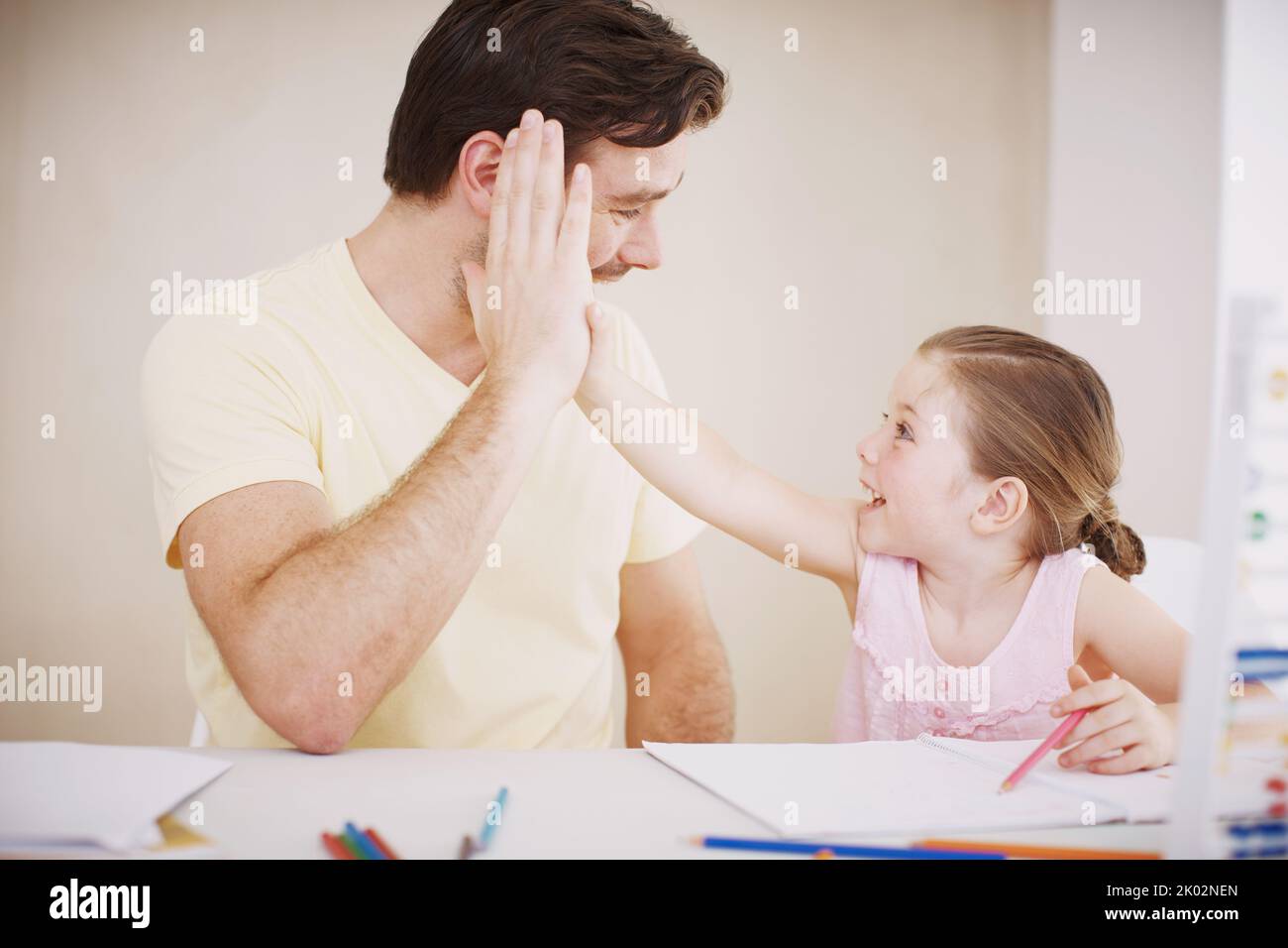 She always does her homework. a little girl doing her homework Stock ...