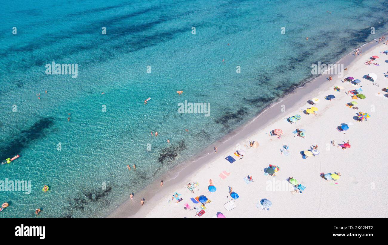 Aerial view of summer beach full of tourist enjoying sea ocean vacation ...