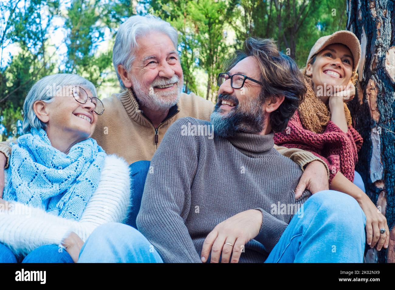 Happy caucasian family mixed generations fathers and sons have fun ...