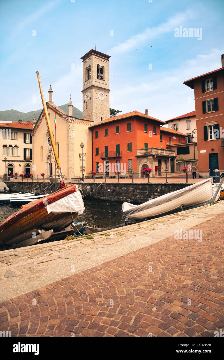 A vertical shot of Saint Thecla church behind Lake Como, Italy Stock ...