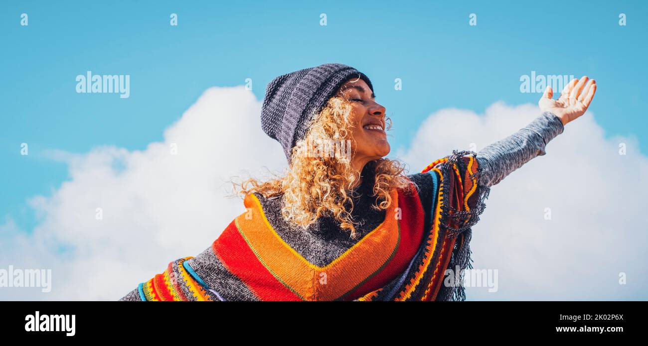 Overjoed adult woman outstretching arms with happy posture. Life ...