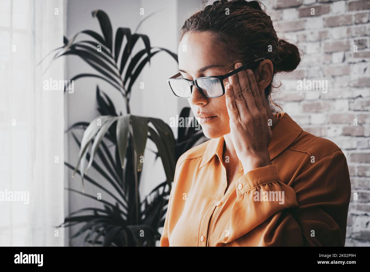 People suffering for headache pain. Young adult cute woman touching her ...