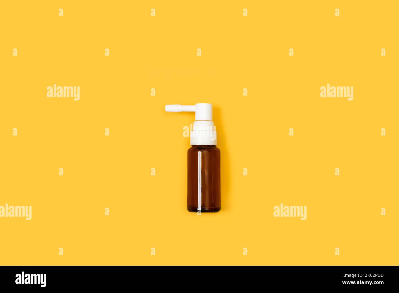 Medical sprayer bottle on a yellow background with copy space Stock ...