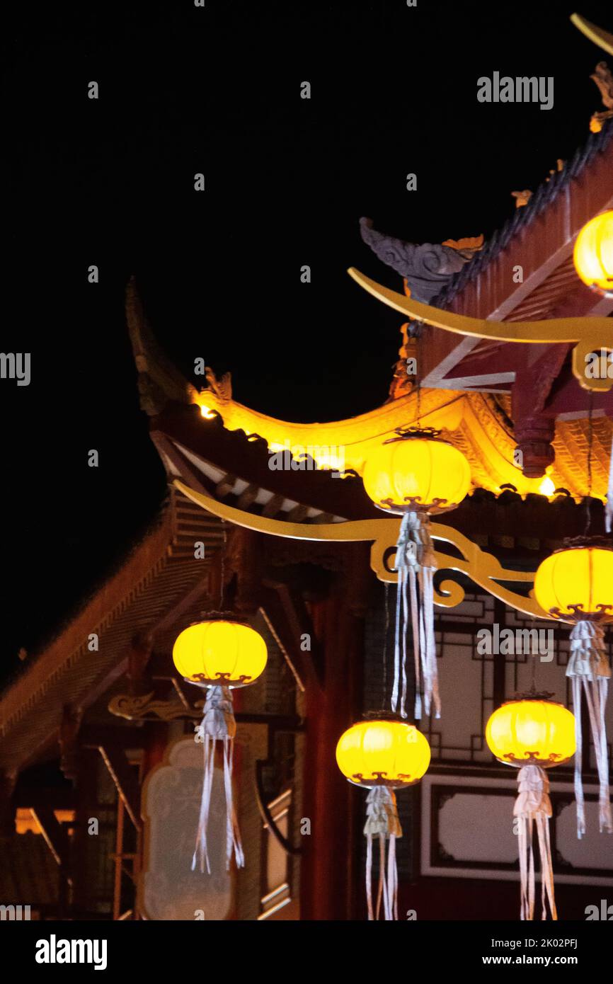 A vertical shot of the illuminated details of the Impression Water ...