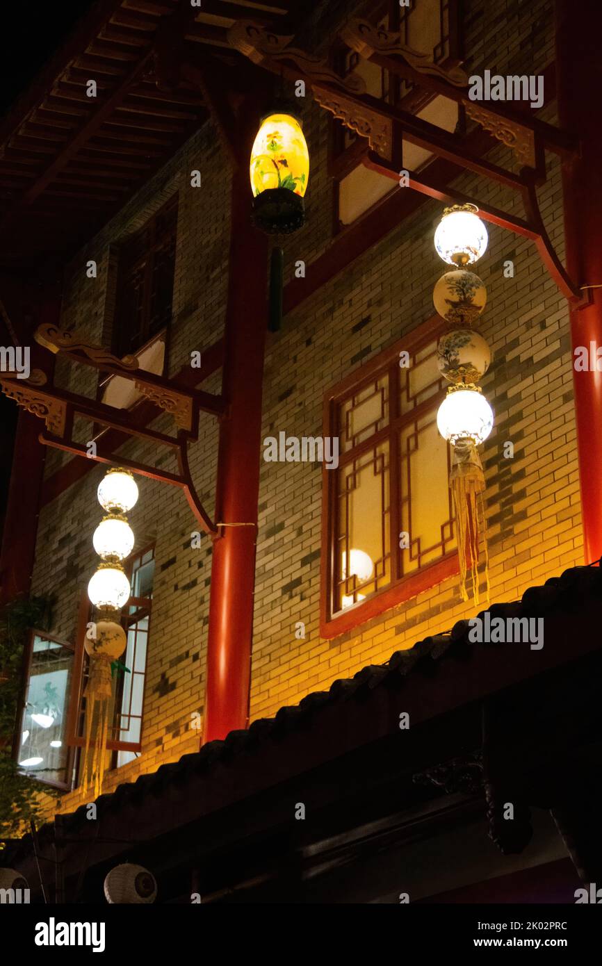 A vertical shot of the illuminated details of the Impression Water ...