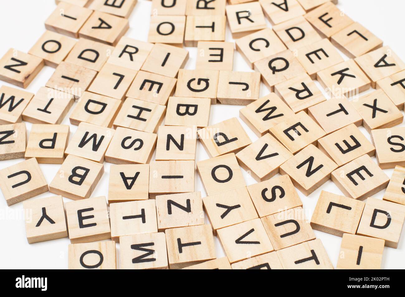 Wooden letter cubes on a white background Stock Photo - Alamy