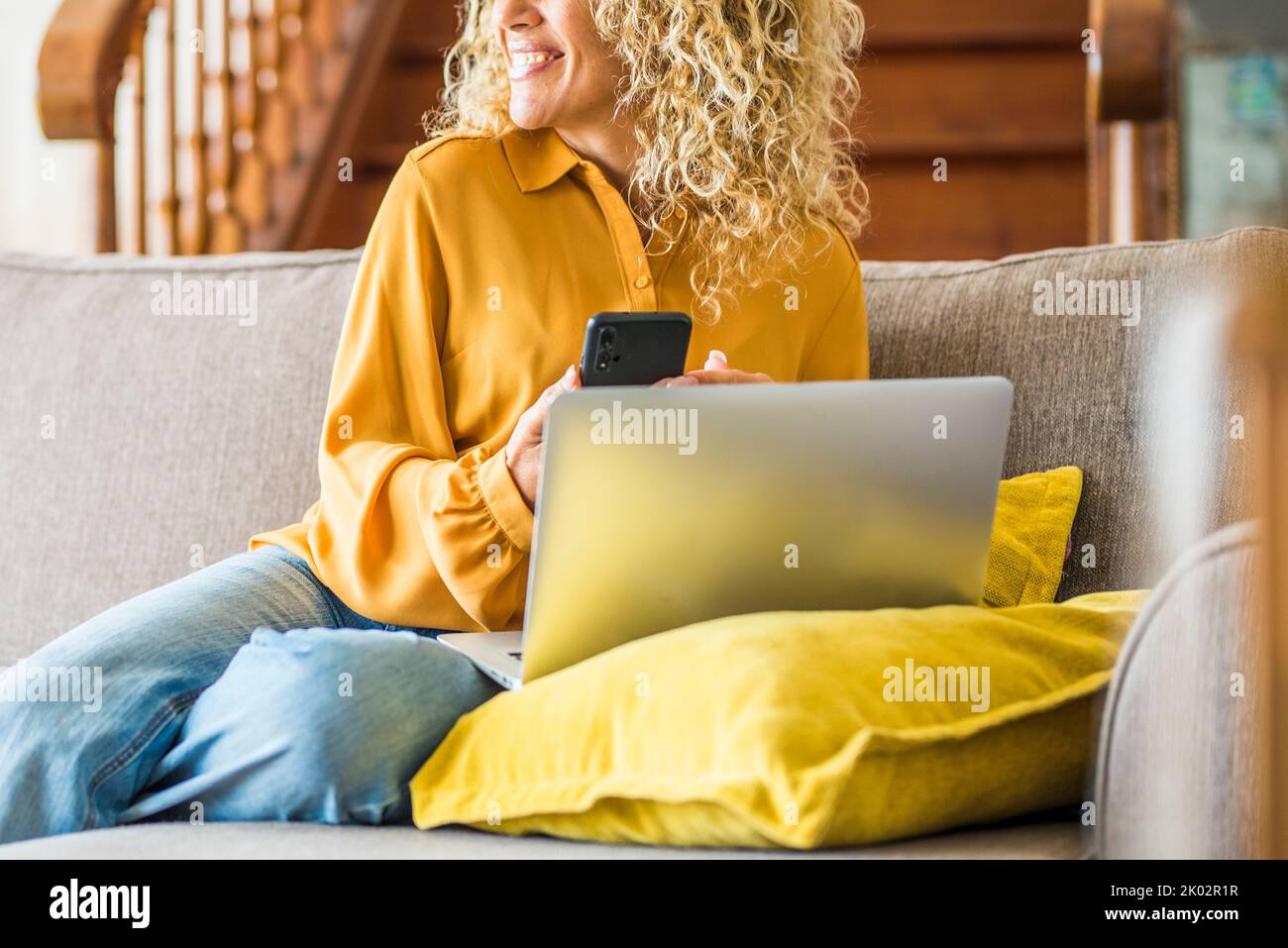 Happy people at home using technology and internet connection. Cheerful ...