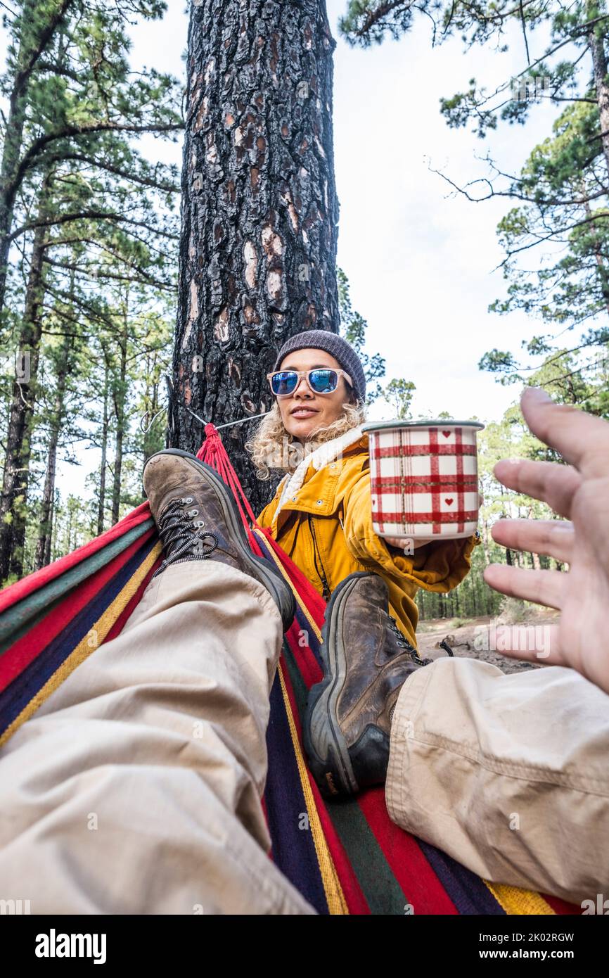 Cheerful woman with cup of coffe enjoy the nature relax outdoor leisure ...