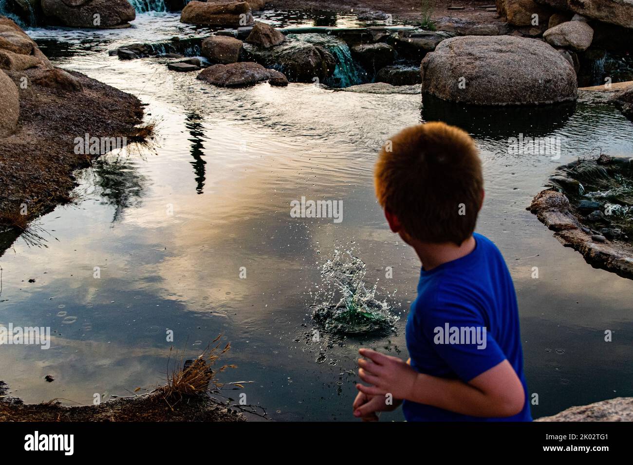 Throwing pebbles hi-res stock photography and images - Alamy